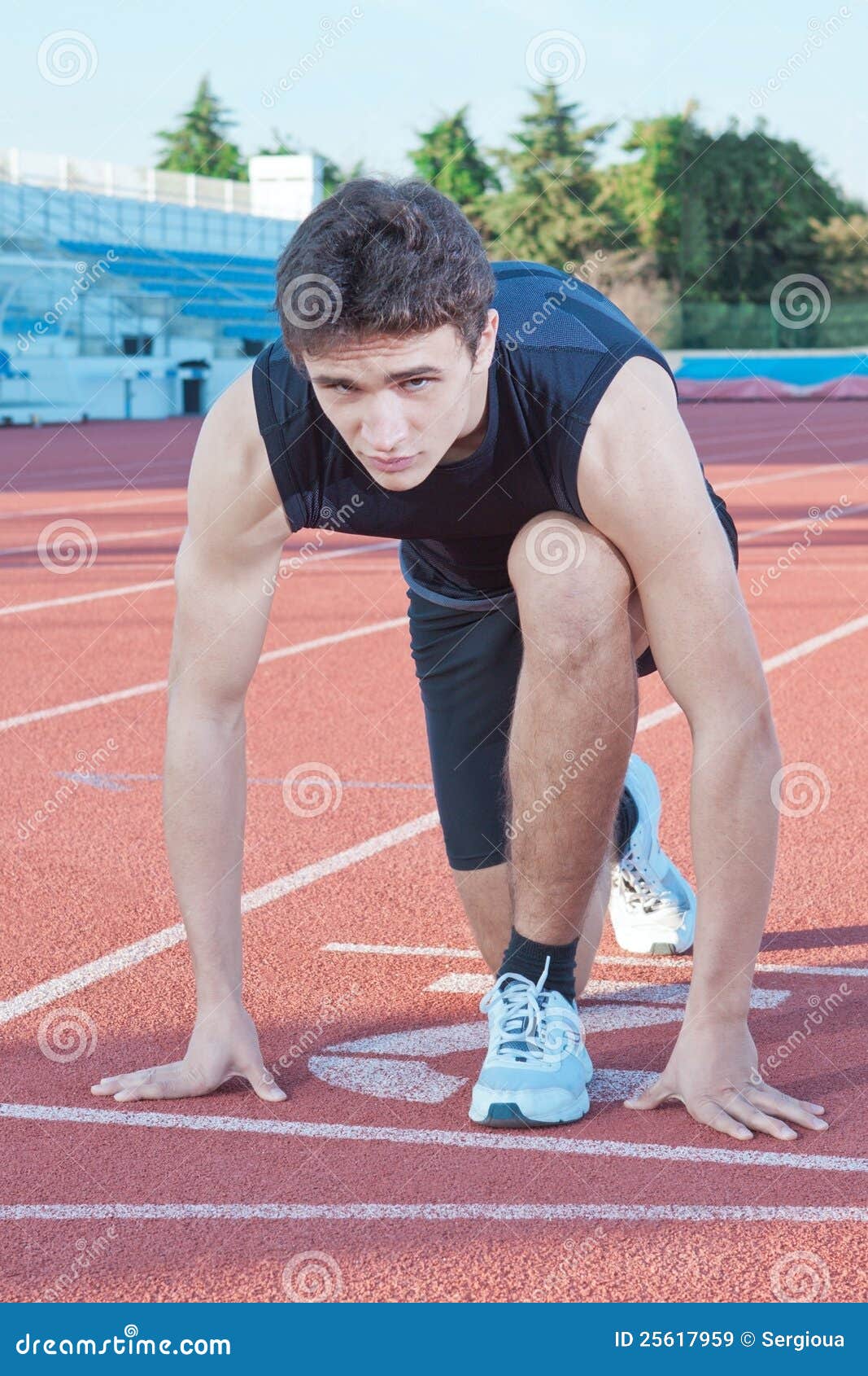 The Young Athlete Will Start with a Low Start. Stock Image - Image of ...