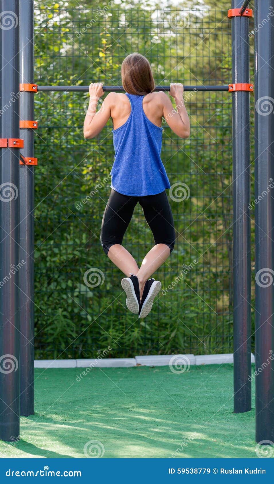 Young Athletic Girl Pulls on the Bar. Stock Image - Image of pulls ...