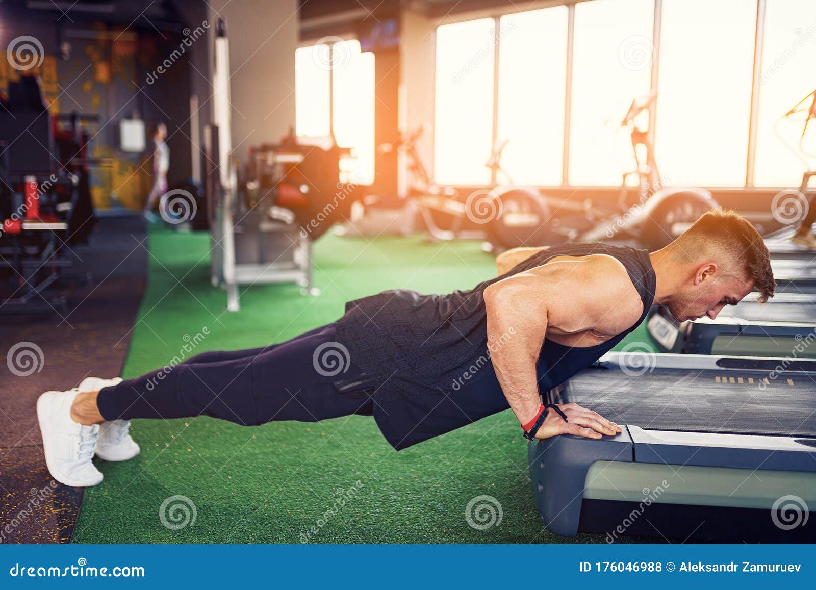 Young Athletic Man Doing Push-ups in Gym. Muscular and Strong Guy ...