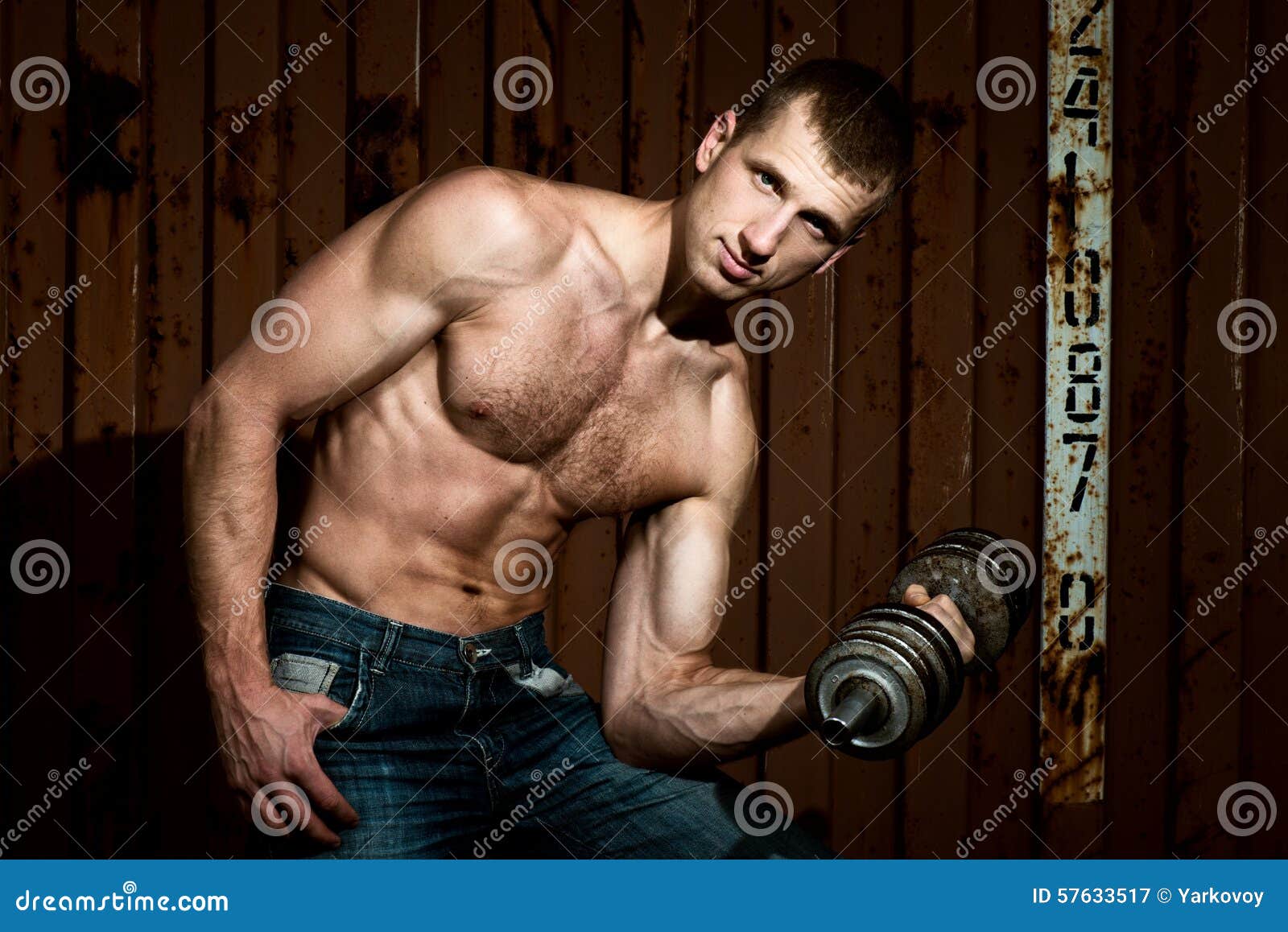 Young Athletic Man Doing Workout with Heavy Dumbbell Stock Image ...