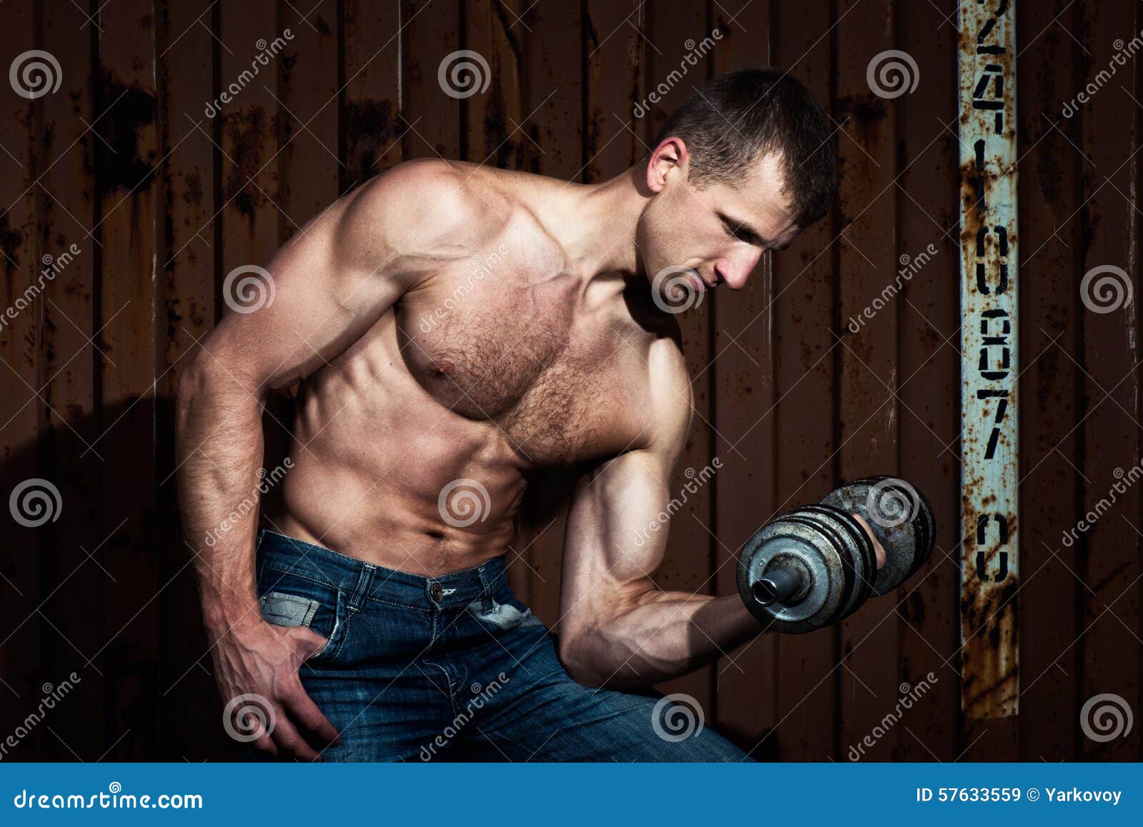 Young Athletic Man Doing Workout with Heavy Dumbbell Stock Image ...