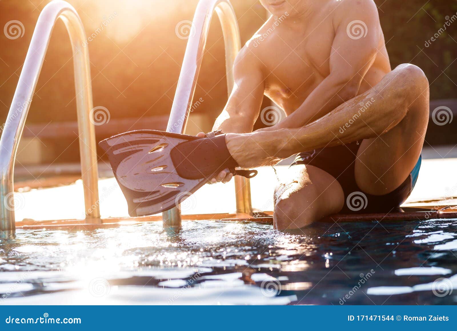 Young Athletic Man Wearing Flippers by the Pool Stock Photo - Image of ...