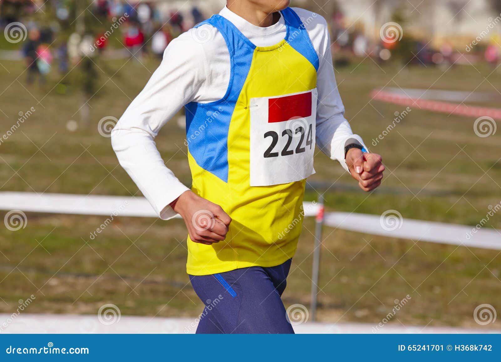 Young Athletic Runner with Number on a Race. Outdoor Circuit Stock ...