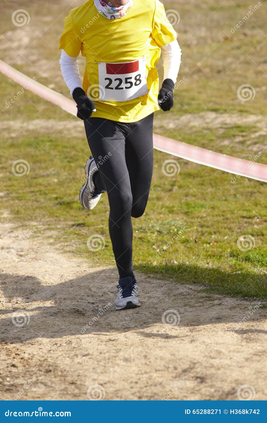 Young Athletic Runner with Number on a Race. Outdoor Circuit Stock ...