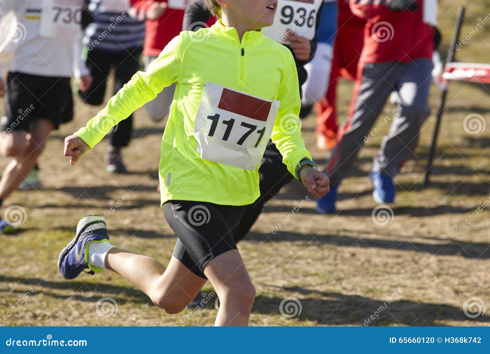Young Athletic Runners on a Race. Outdoor Circuit Stock Photo - Image ...