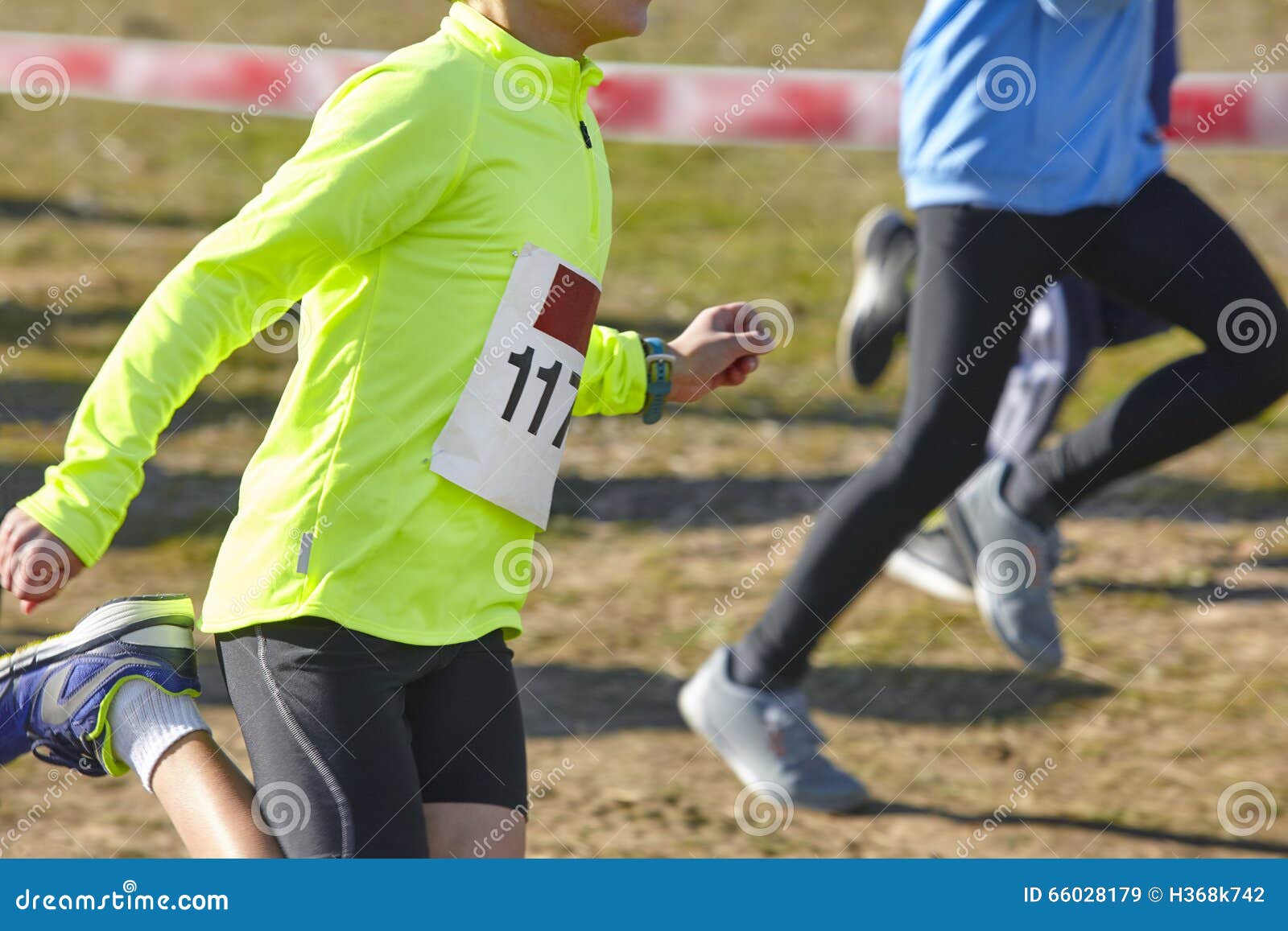 Young Athletic Runners on a Race. Outdoor Circuit Stock Image - Image ...