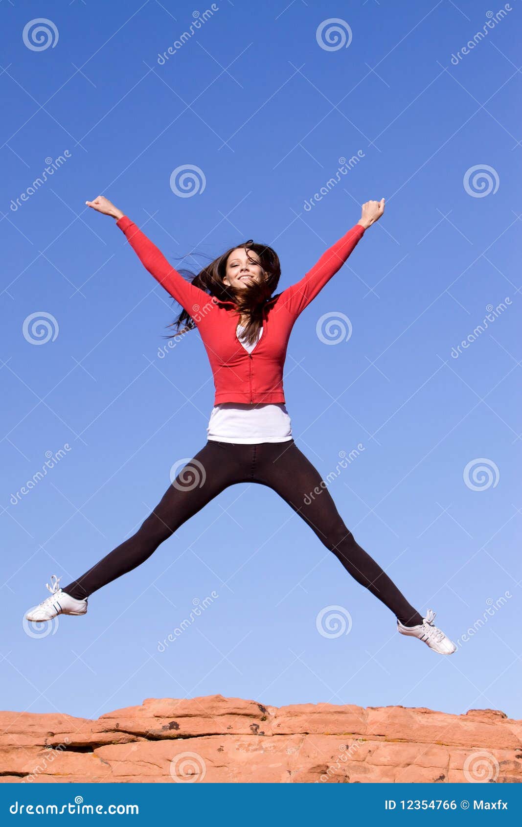 Young Athletic Woman Jumping Stock Photo - Image of brunette, gymnast ...