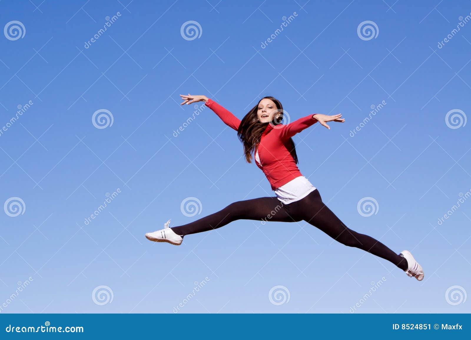 Young Athletic Woman Jumping Stock Image - Image of beautiful, feminine ...