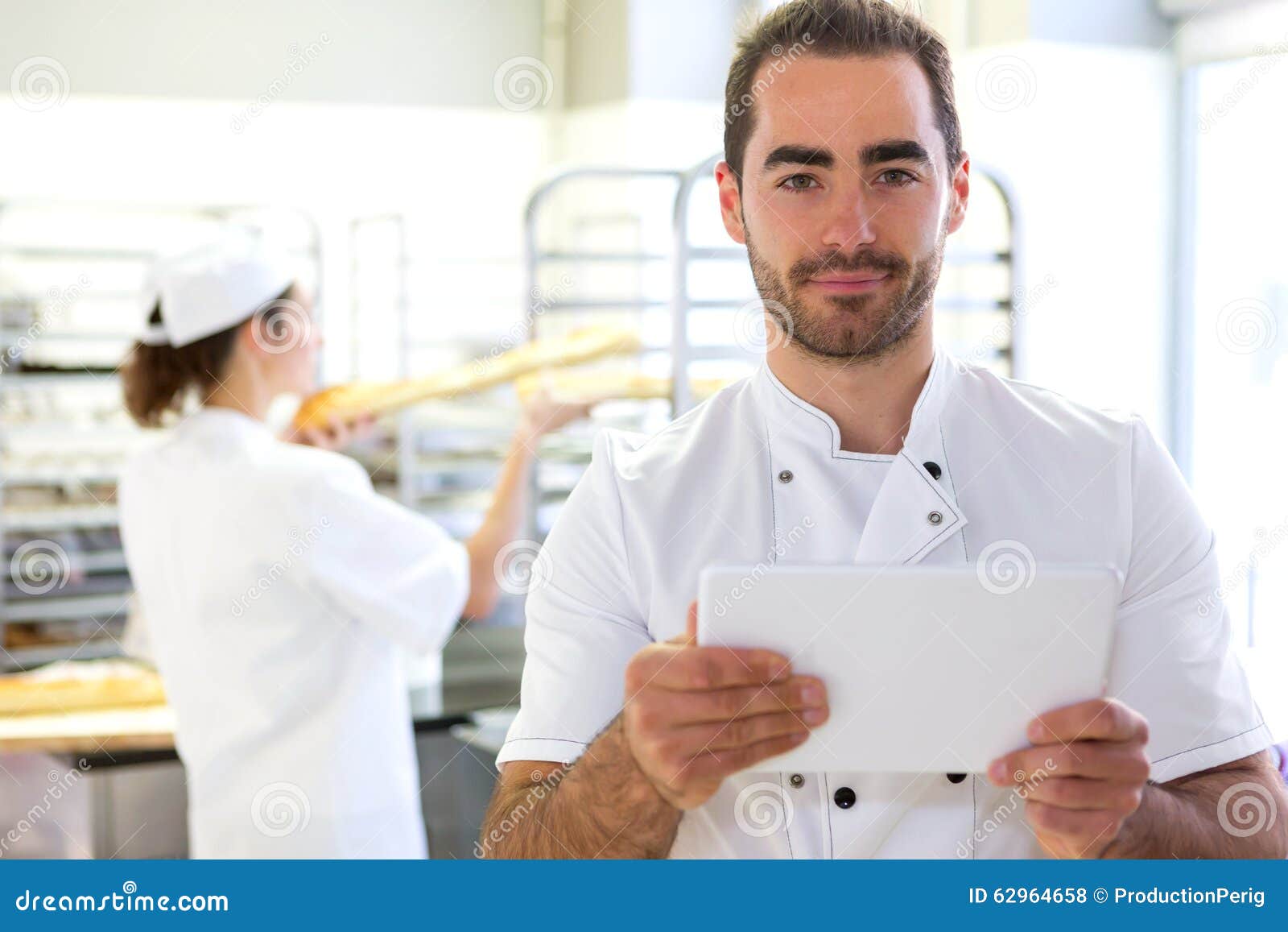 Young Attarctive Baker Working at the Bakery Stock Photo - Image of ...