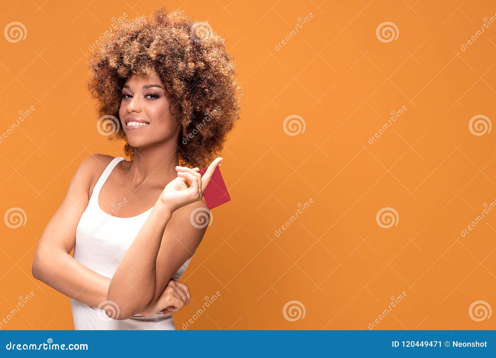 Young Afro Girl Holding Credit Card on Yellow Background. Stock Image ... Young Afro Girl Holding Credit Card on Yellow Background. Stock Image ...