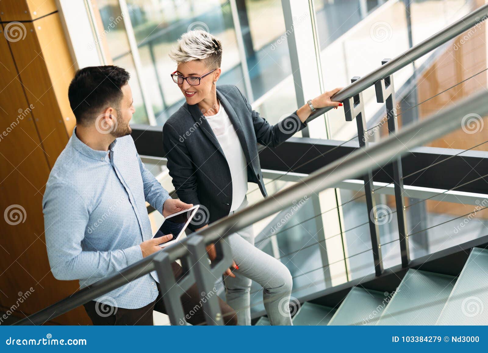 Young Architects Talking on Their Way To Office Stock Image - Image of ...