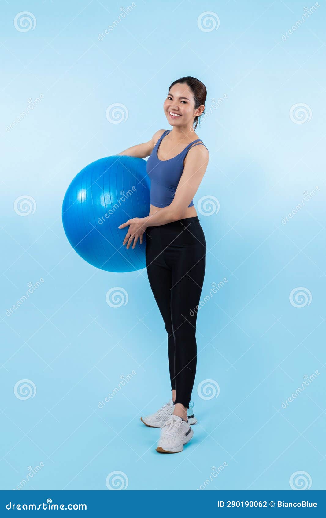 Young Attractive Asian Woman Portrait In Sportswear With Fit Ball
