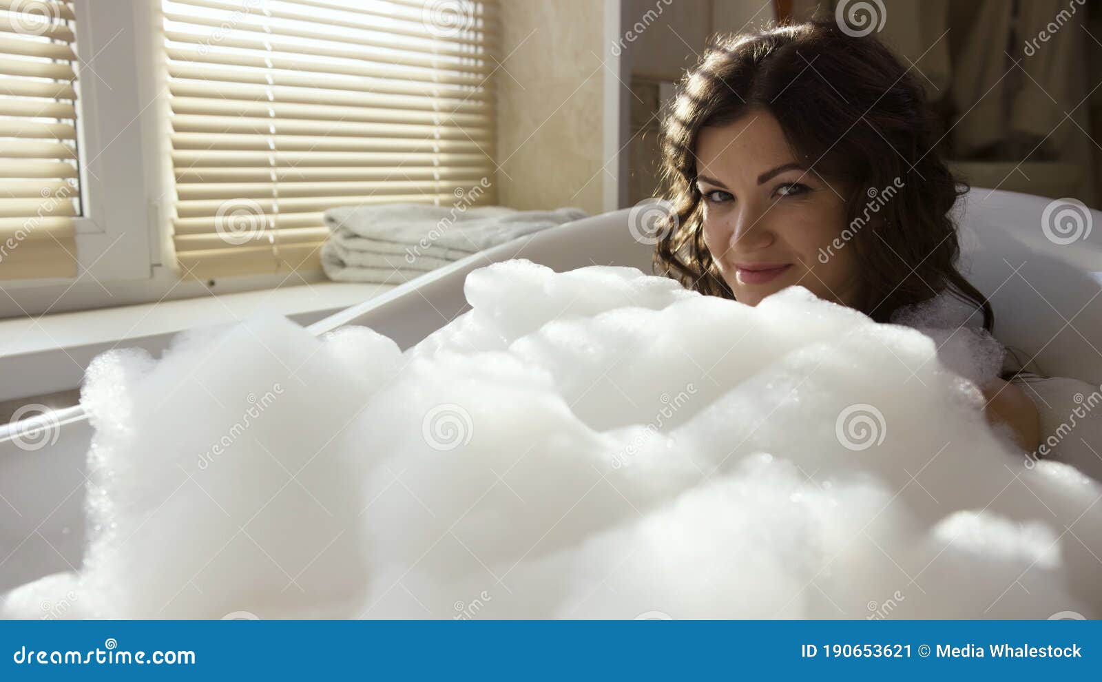 Young Attractive Brunette Relaxing And Taking A Bubble Bath Video