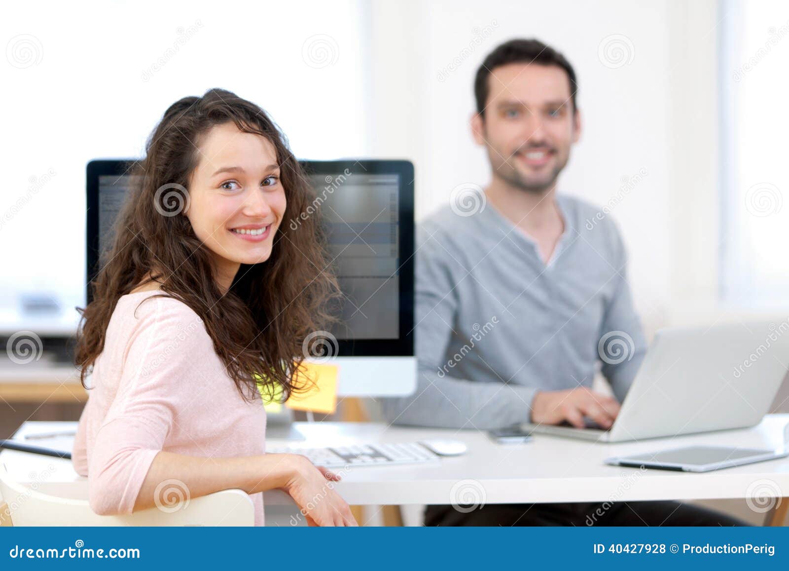 Young Attractive Co-worker at the Office Stock Photo - Image of office ...