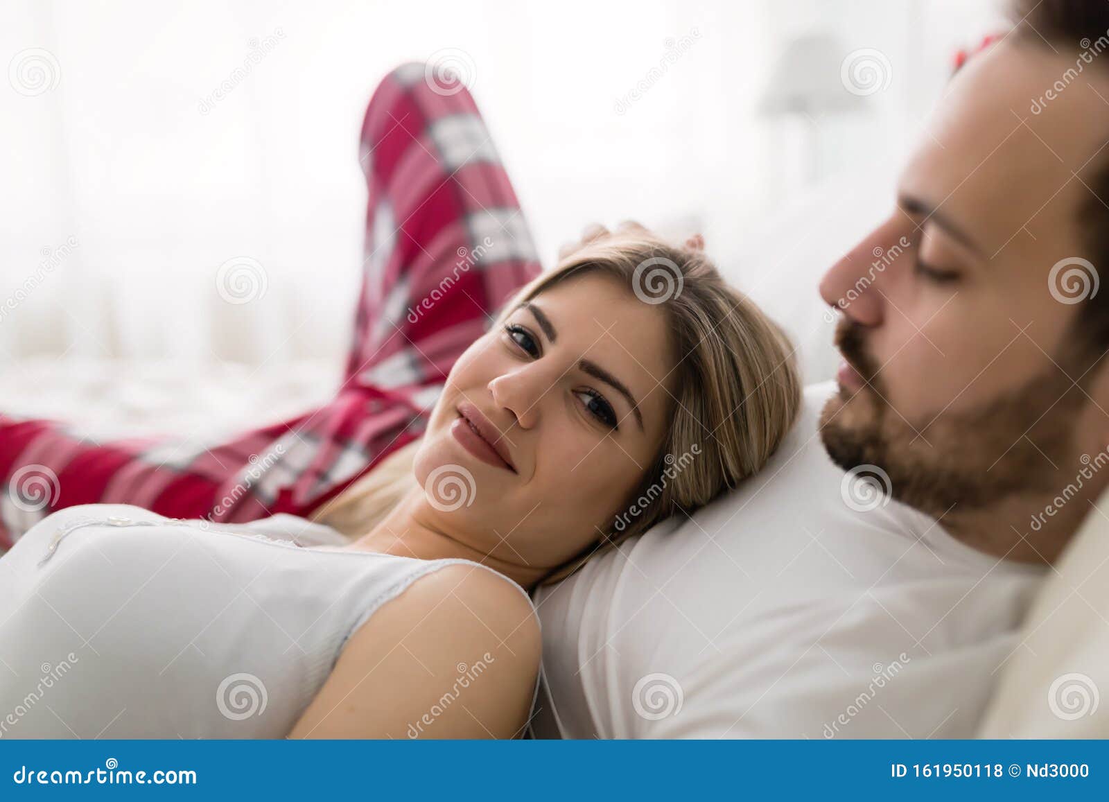 Young Attractive Couple Having Romantic Time in Bed Stock Photo - Image ...