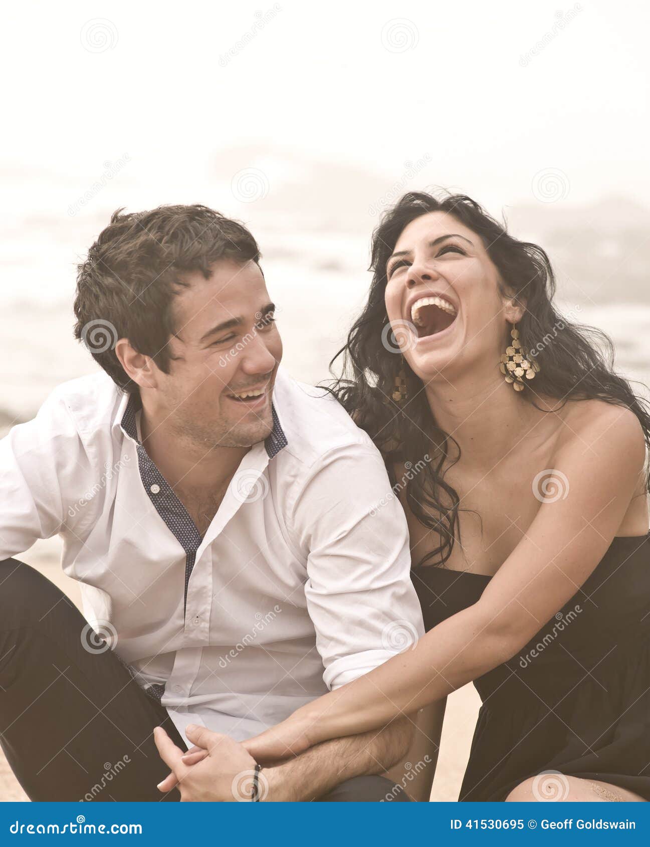 Young Attractive Couple Laughing on Beach Stock Image - Image of adult ...