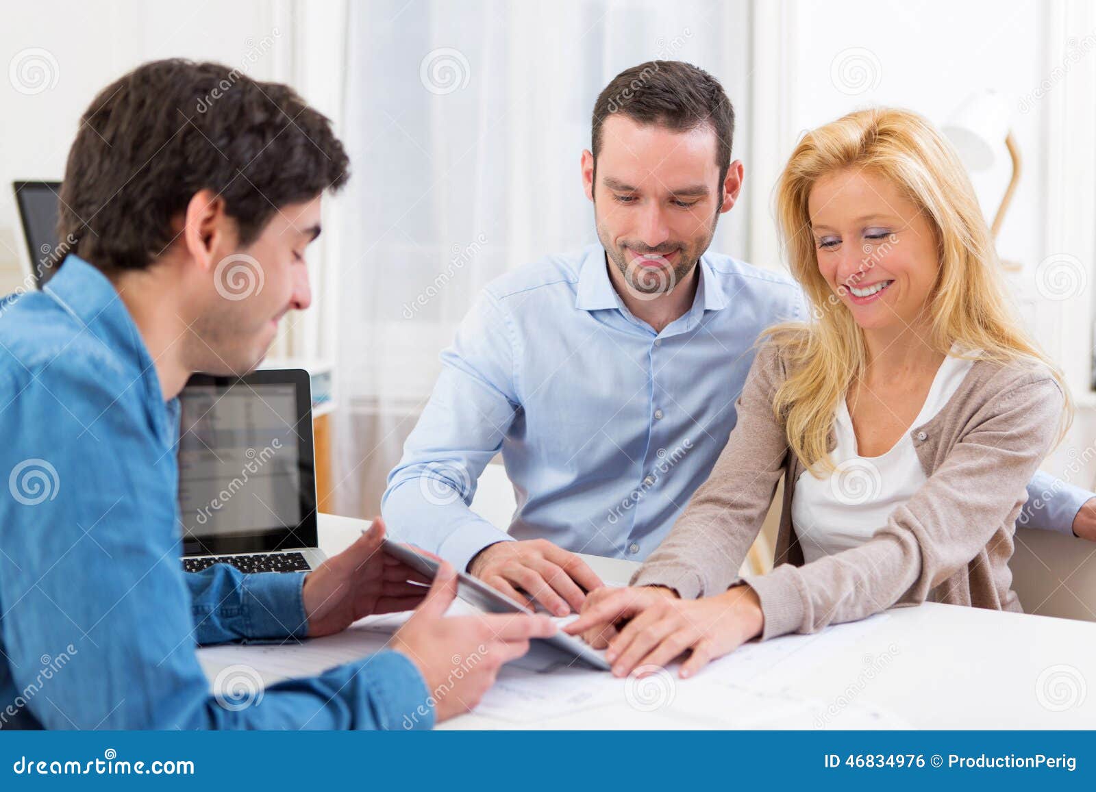 Young Attractive Couple Signing Contract on Tablet Stock Photo - Image ...