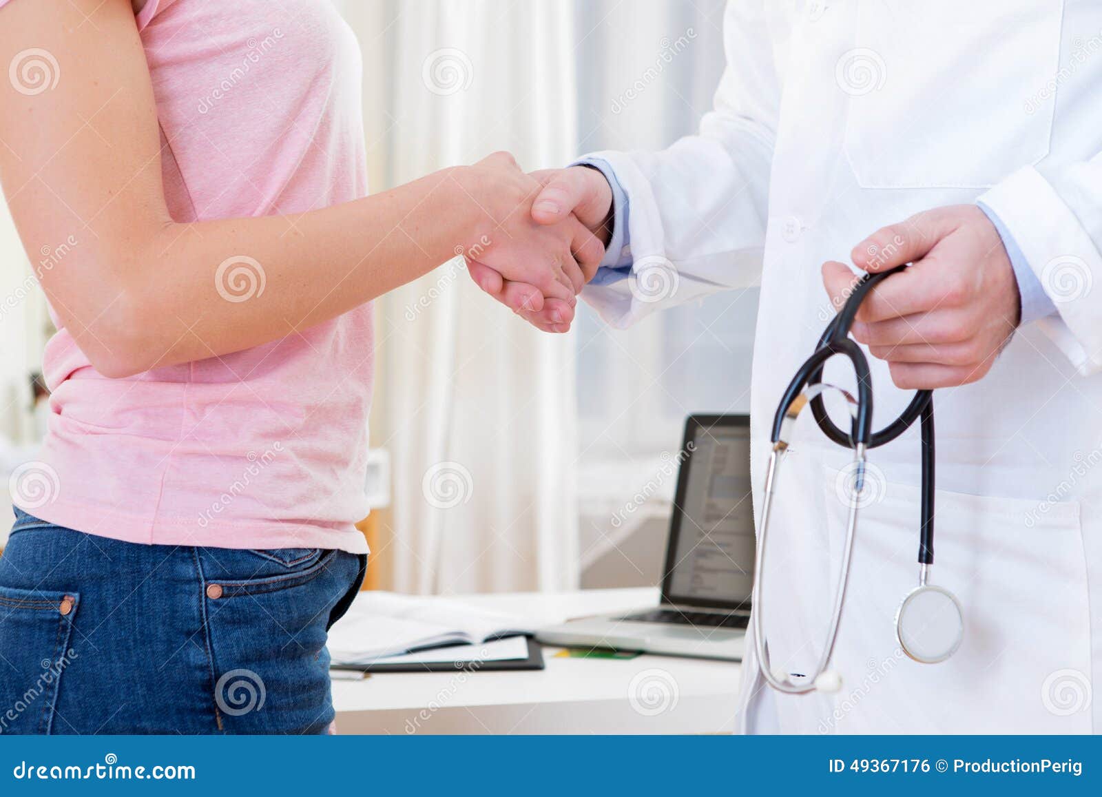 Young Attractive Doctor Shaking Hand of His Patient Stock Photo - Image ...