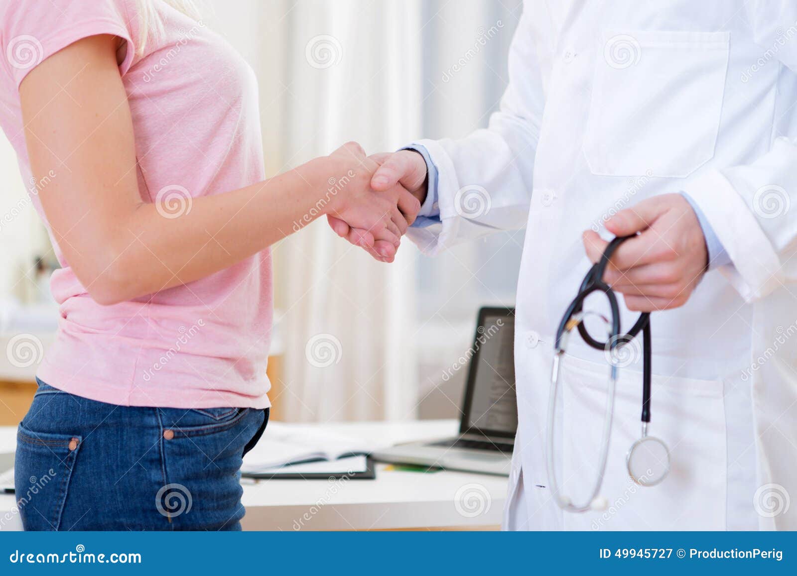 Young Attractive Doctor Shaking Hand of His Patient Stock Image - Image ...