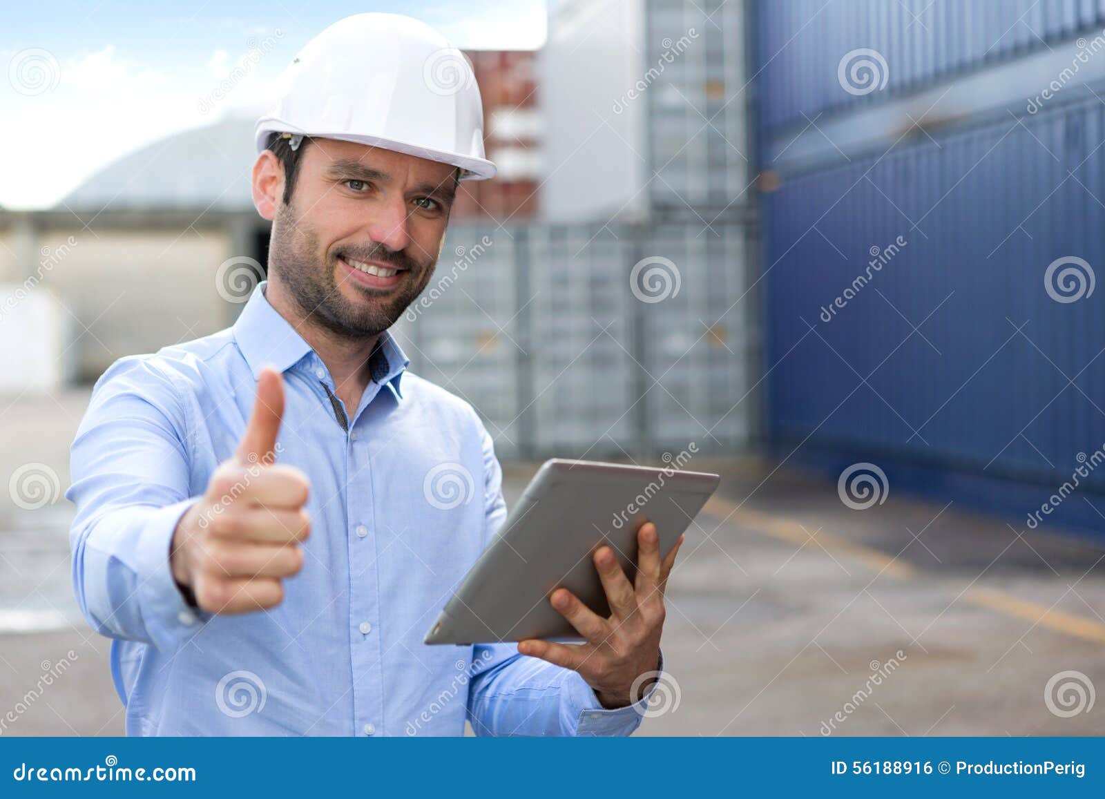 Young Attractive Engineer Using Tablet on the Dock Stock Photo - Image ...