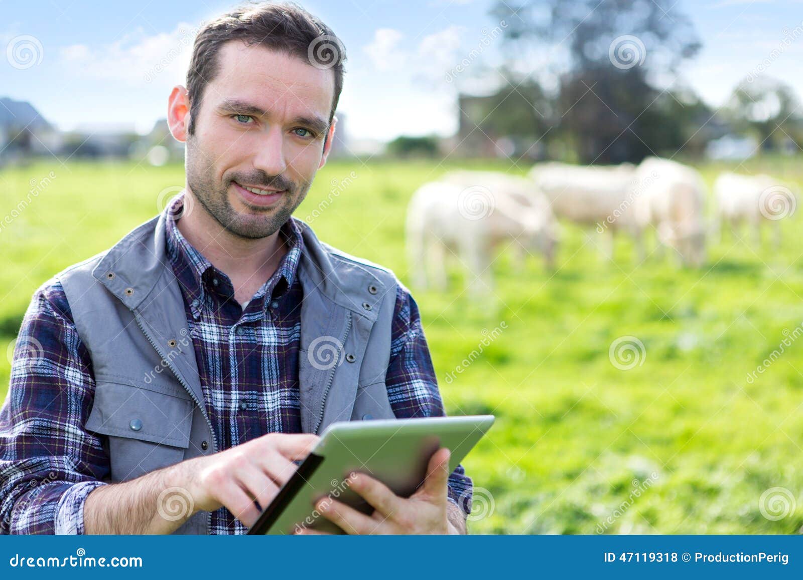 Young Attractive Farmer Using Tablet in a Field Stock Photo - Image of ...