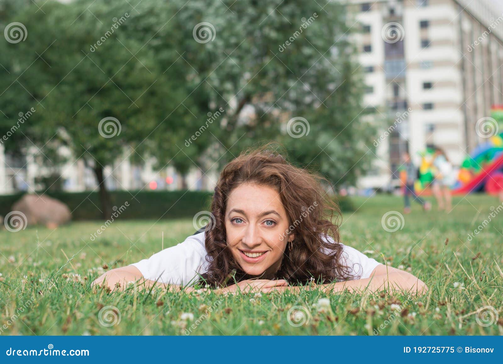 Young Attractive Girl Lying In The Grass Stock Image Image Of Smile