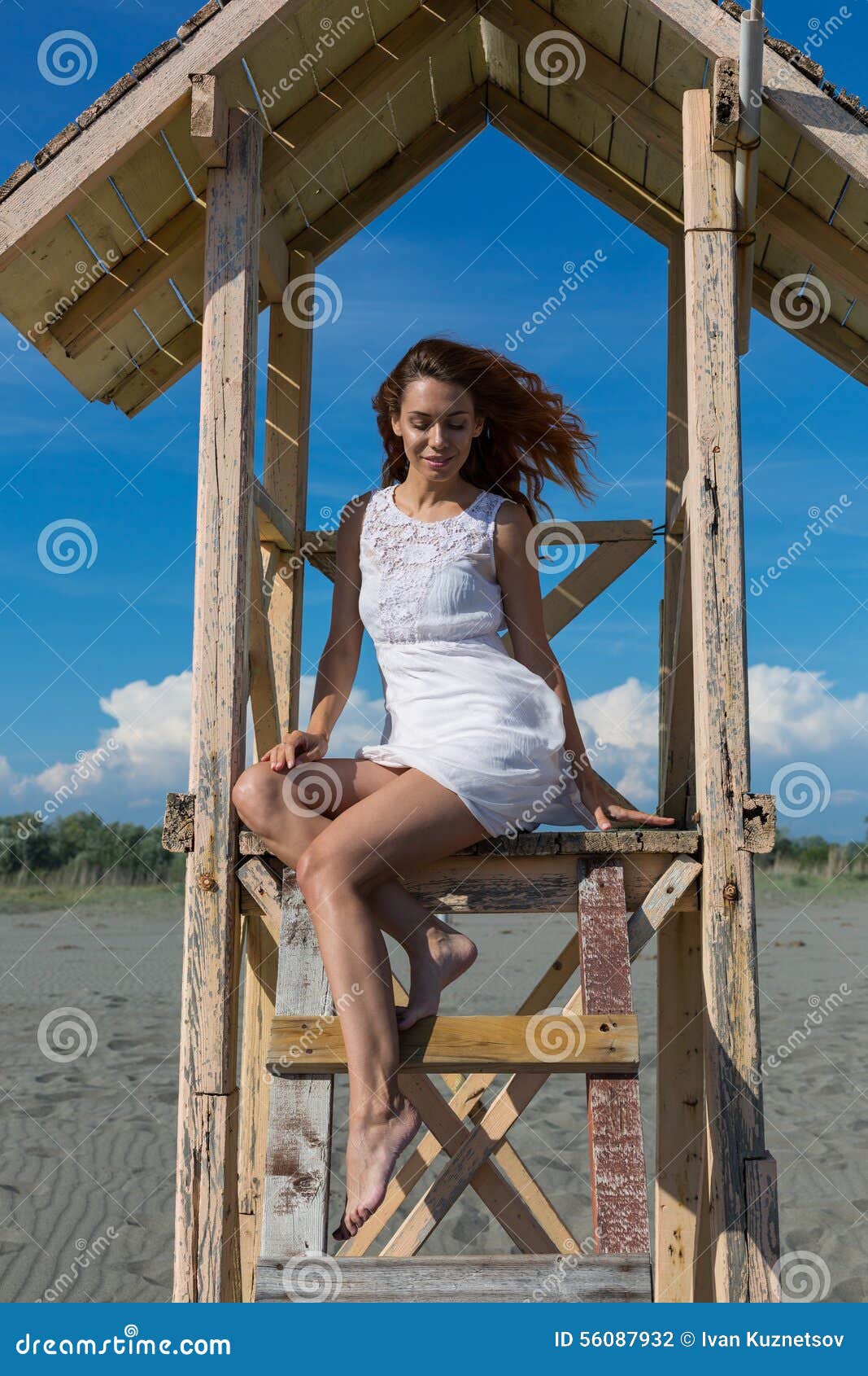 Young Attractive Girl Posing on a Lifeguard Tower Stock Photo - Image ...