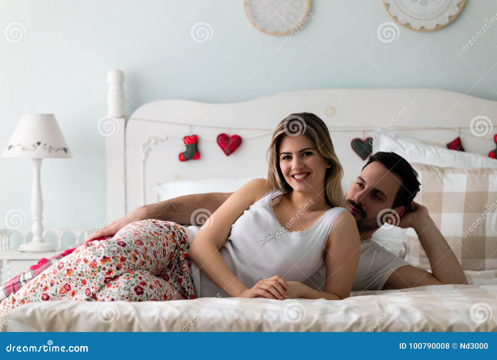 Young Attractive Couple Having Romantic Time in Bed Stock Photo - Image ...