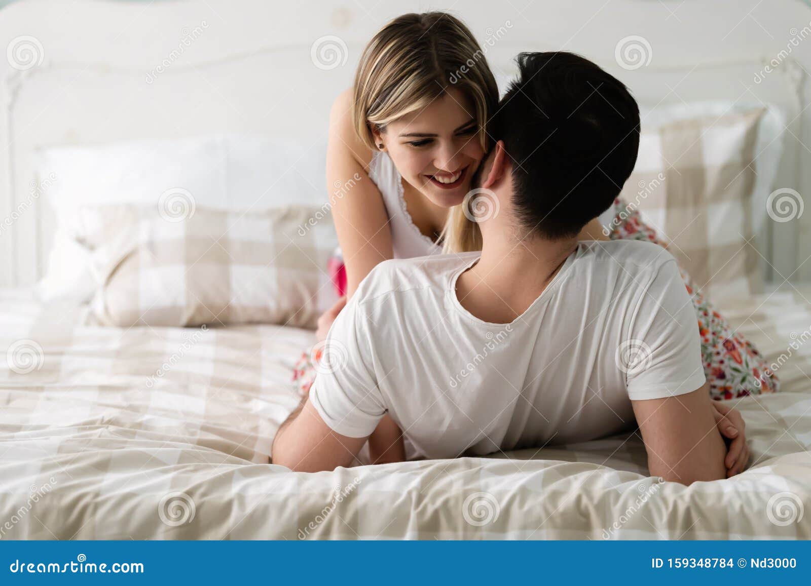 Young Attractive Couple Having Romantic Time in Bed Stock Photo - Image ...