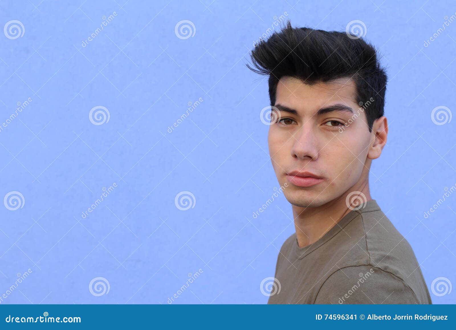 Young Attractive Man in Blue Background with Copy Space Stock Image ...