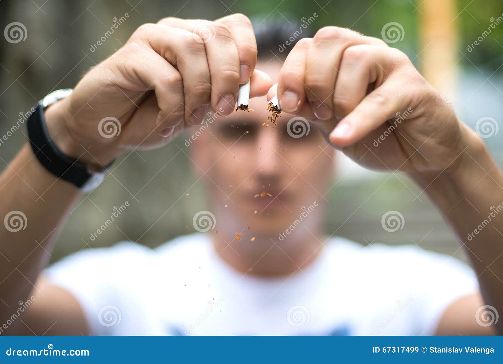 Young Attractive Man Breaking Cigarette Stock Image - Image of healthy ...