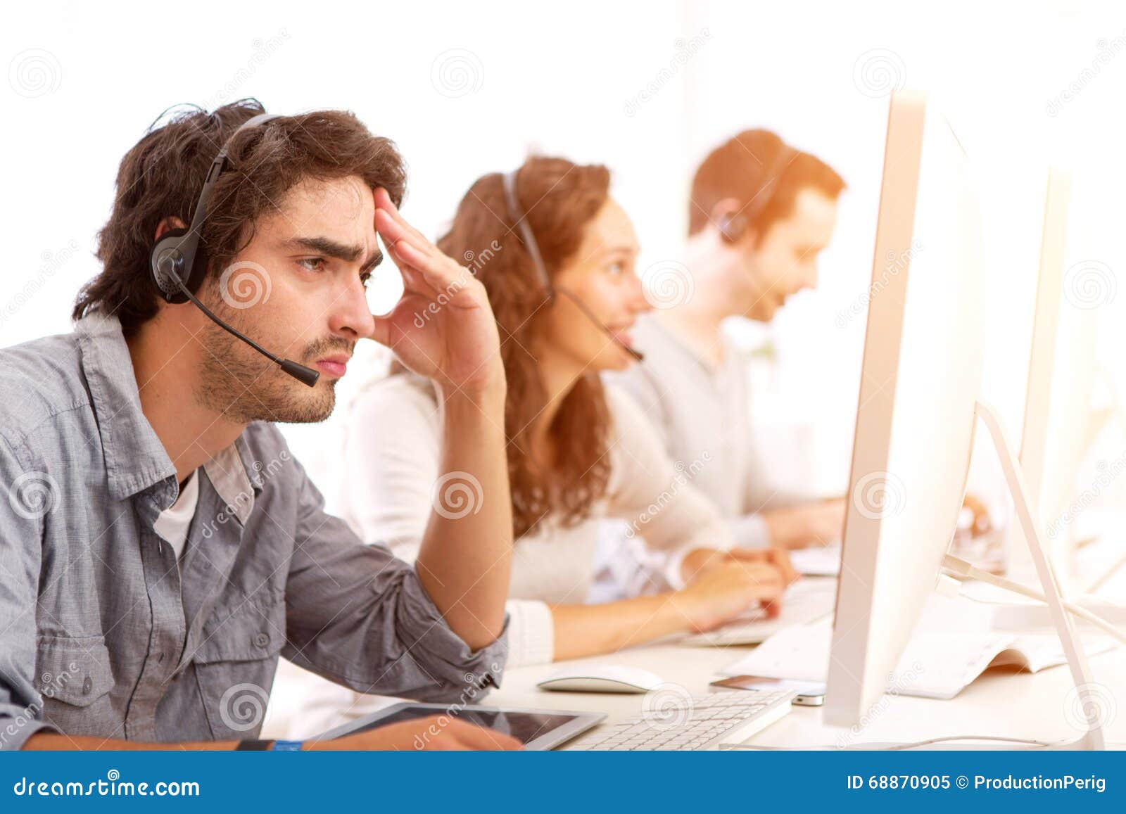 Young Attractive Man Ill-at-ease at Work Stock Image - Image of ...