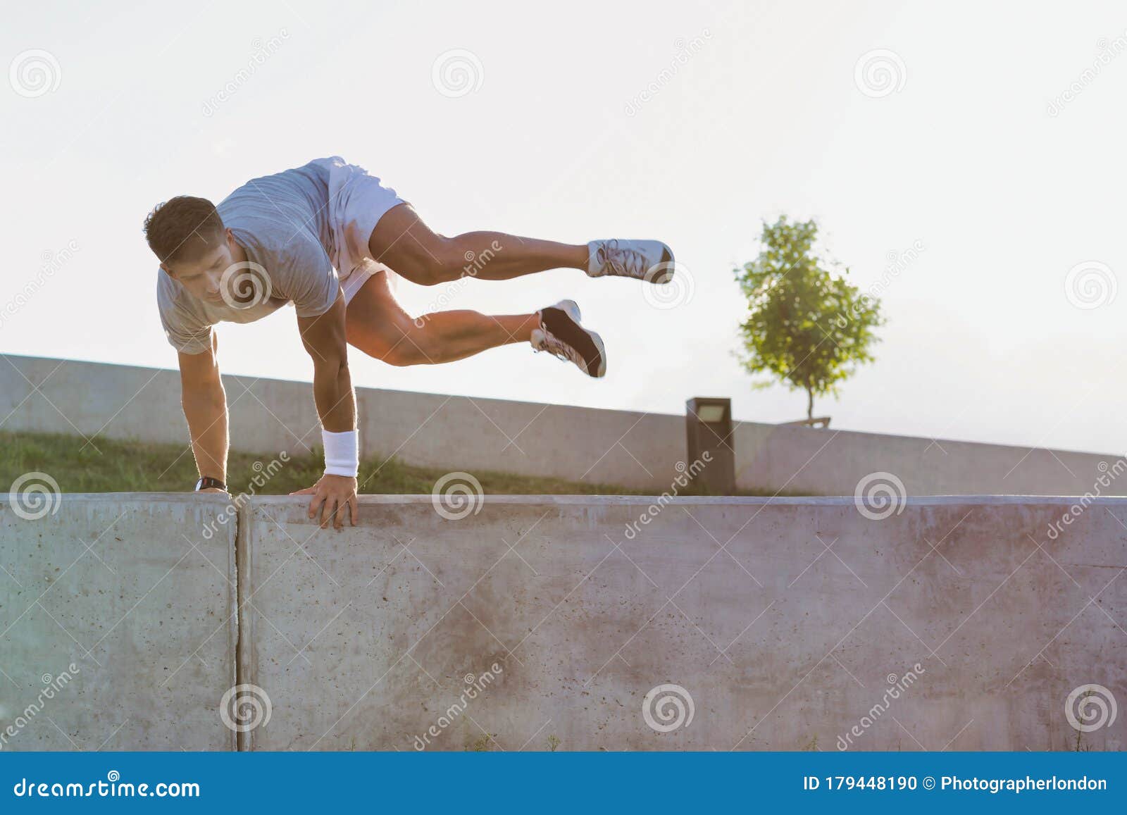 Young Attractive Man Jumping on Wall Stock Photo - Image of male ...
