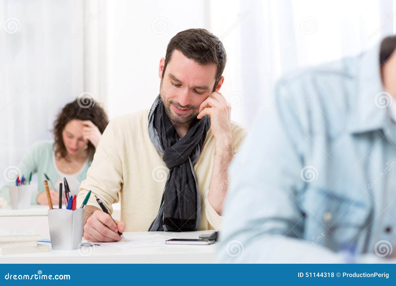 Young Attractive Man Taking Competitive Exam Stock Photo - Image of ...
