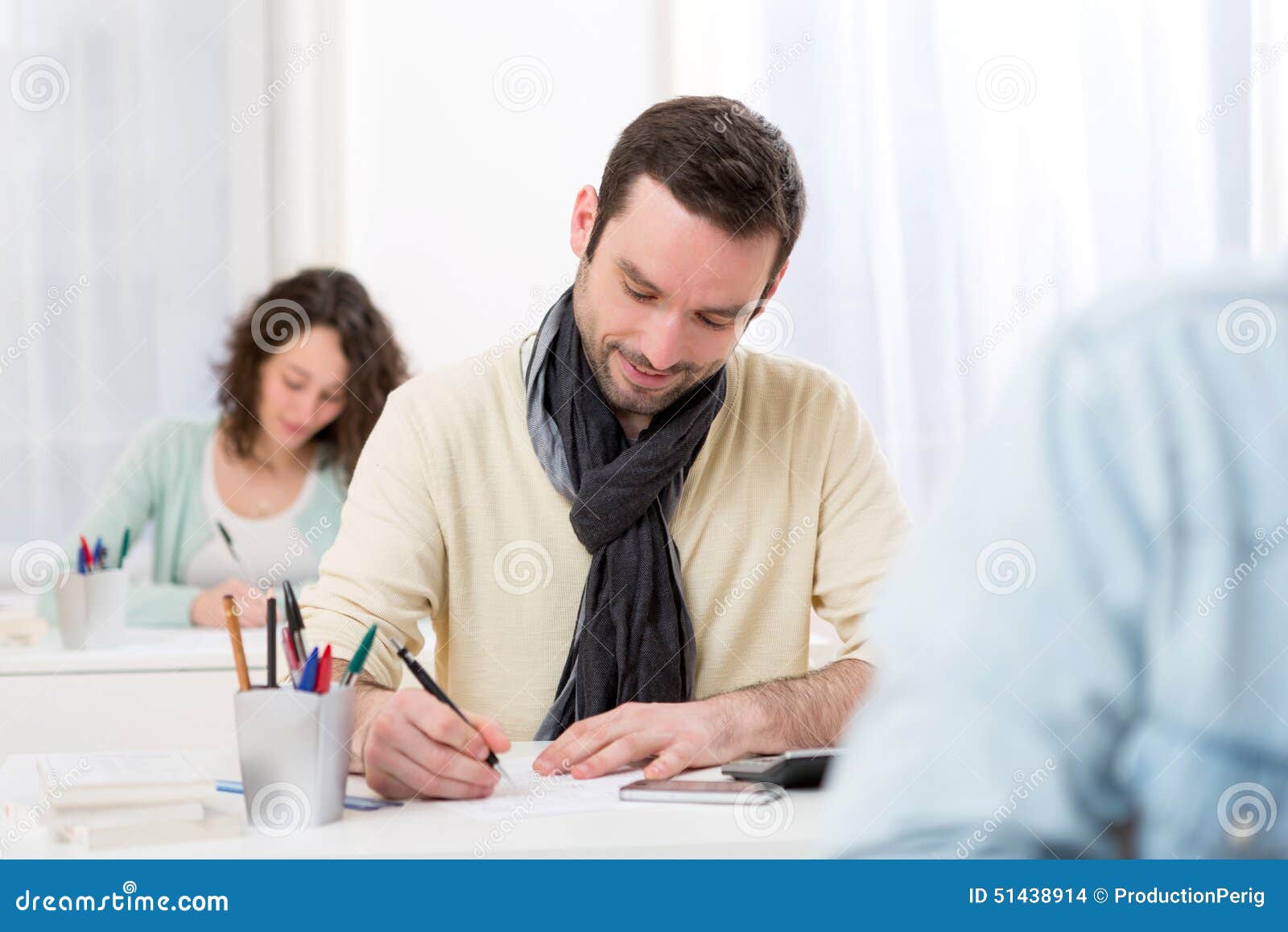 Young Attractive Man Taking Competitive Exam Stock Photo - Image of ...