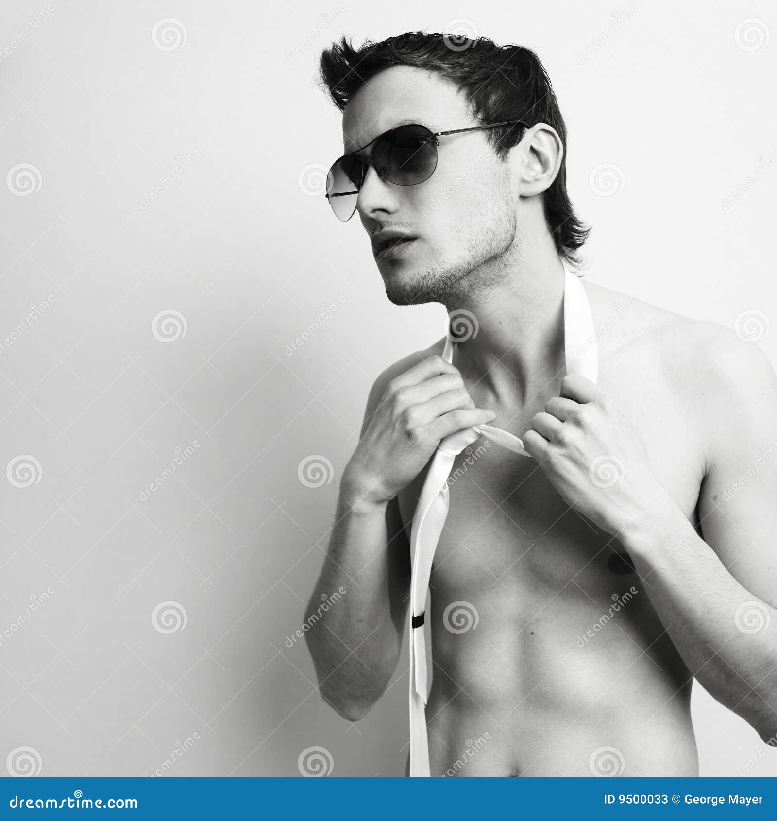 Young Attractive Man Tries on Tie Stock Image - Image of attractive ...