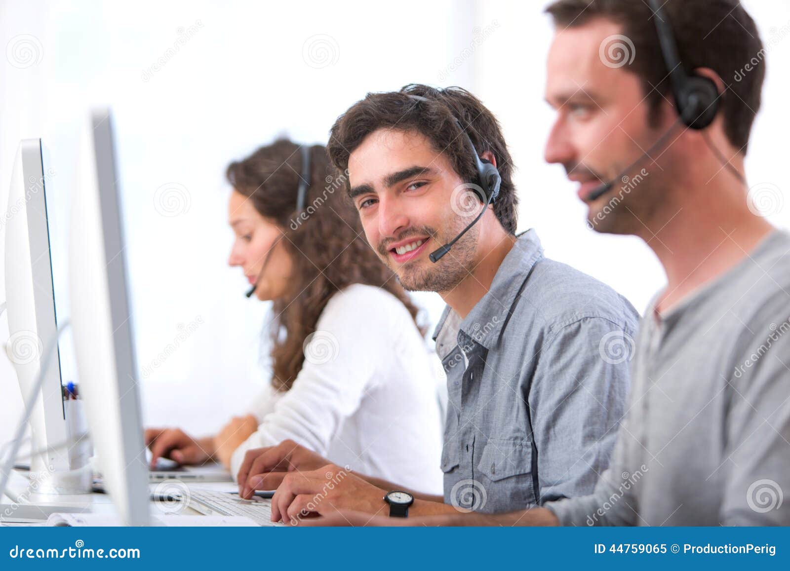 Young Attractive Man Working in a Call Center Stock Image - Image of ...