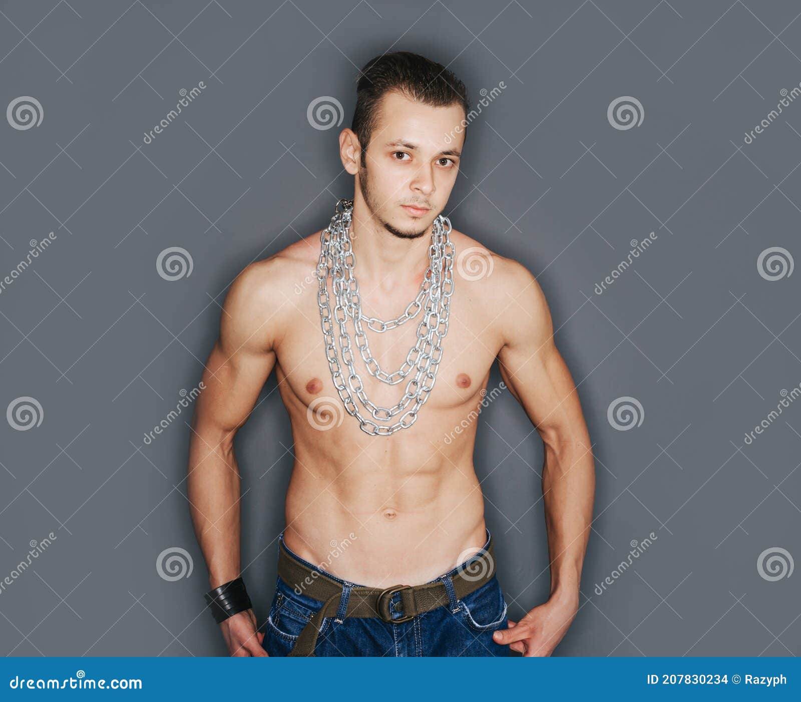 Bodybuilder with chains stock photo. Image of strength - 207830234