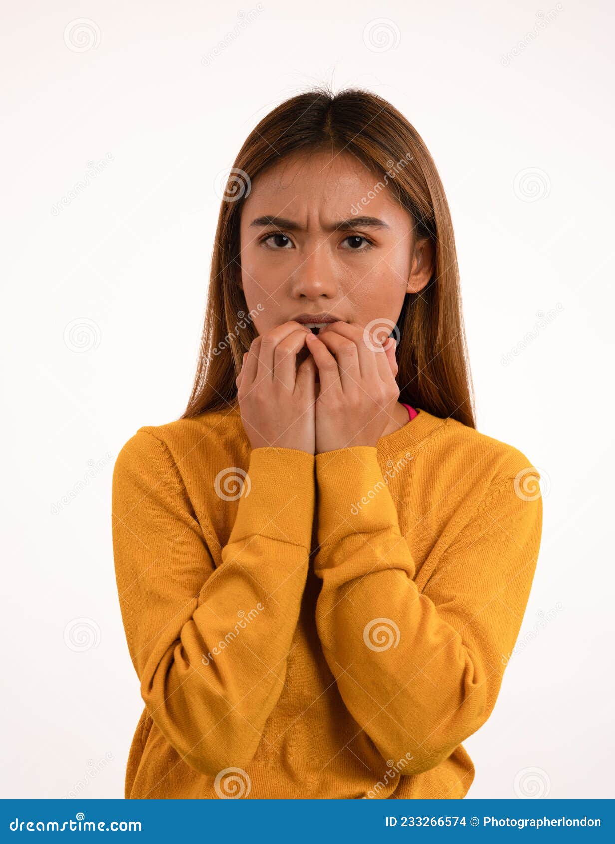Young Attractive Nervous Scared Asian Girl in Studio Stock Photo ... Young Attractive Nervous Scared Asian Girl in Studio Stock Photo ...
