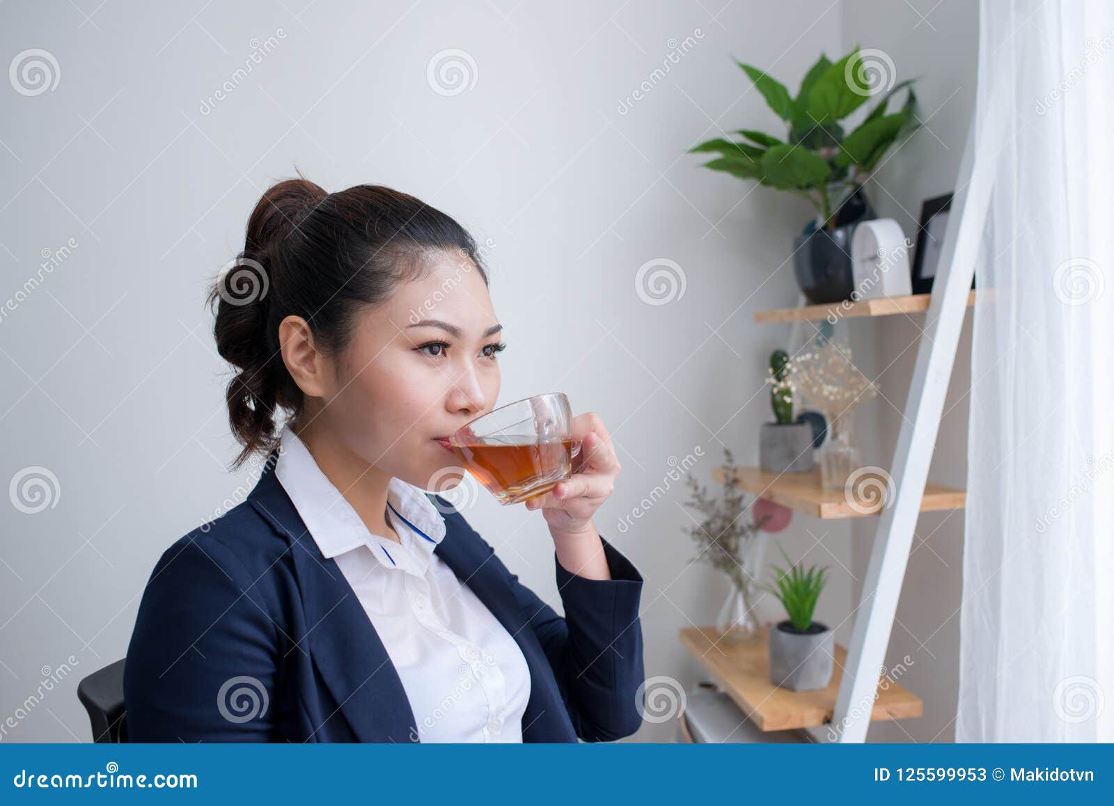 Young Attractive Office Worker Drinking Cup of Tea, Having Coffee Break ...