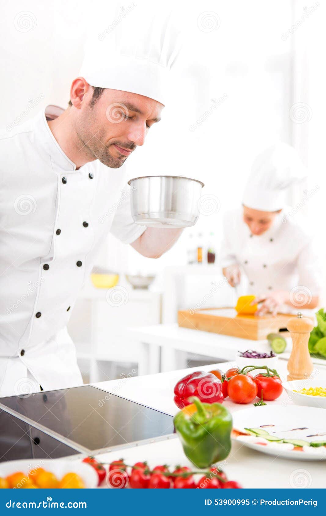 Young Attractive Professional Chef Cooking in His Kitchen Stock Image ...