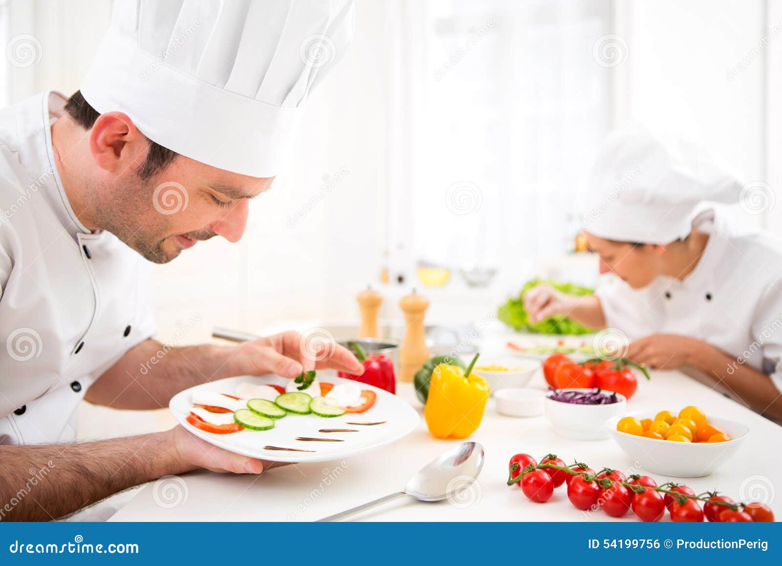 Young Attractive Professional Chef Cooking in His Kitchen Stock Photo ...