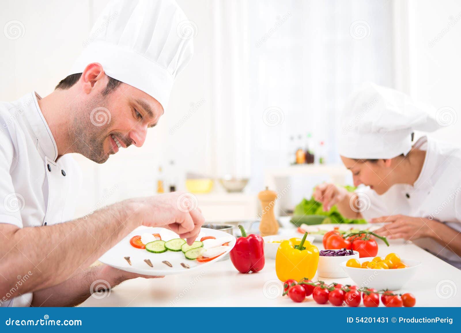 Young Attractive Professional Chef Cooking in His Kitchen Stock Image ...