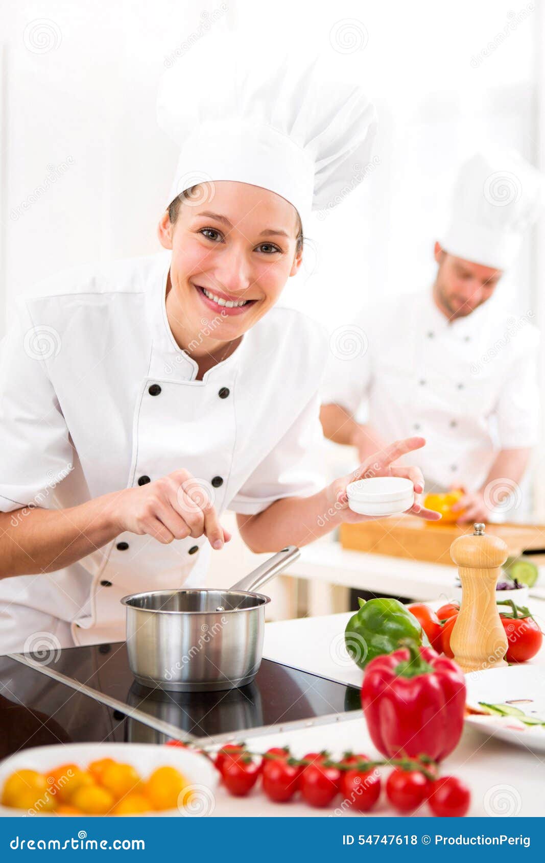 Young Attractive Professional Chef Cooking in His Kitchen Stock Photo ...