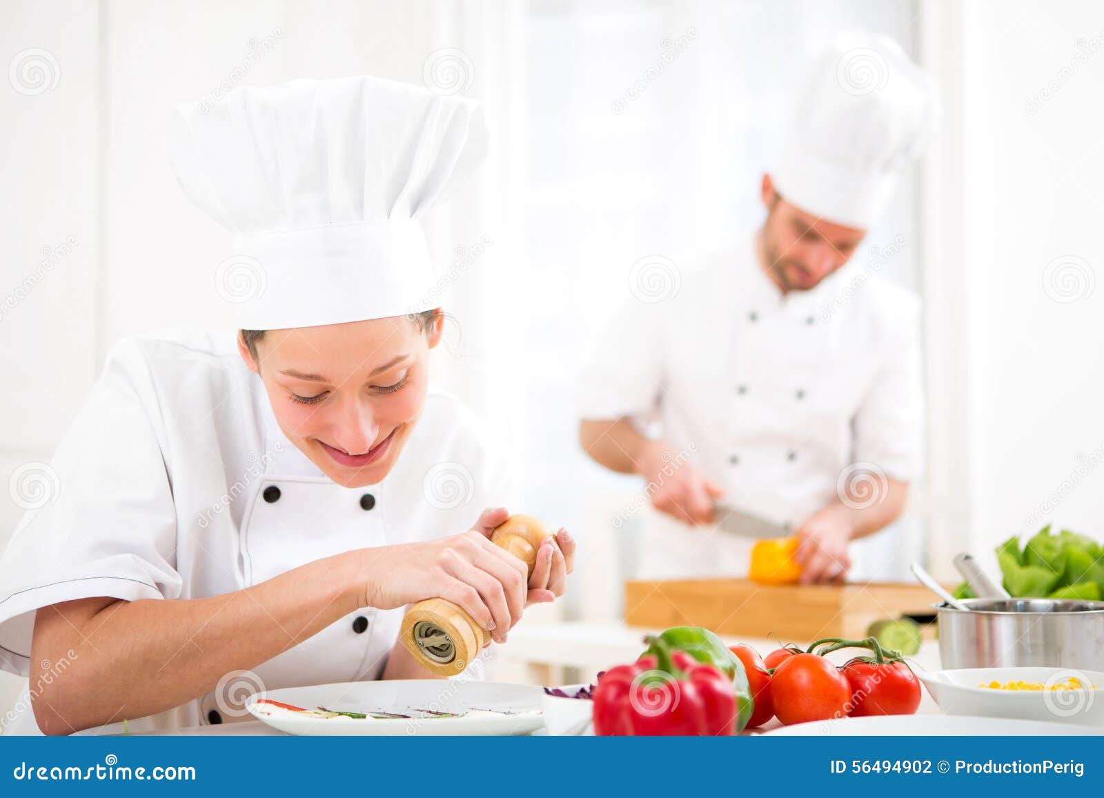 Young Attractive Professional Chef Cooking in His Kitchen Stock Photo ...