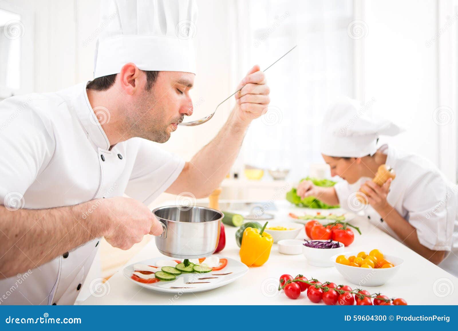 Young Attractive Professional Chef Tasting Sauce Stock Photo - Image of ...