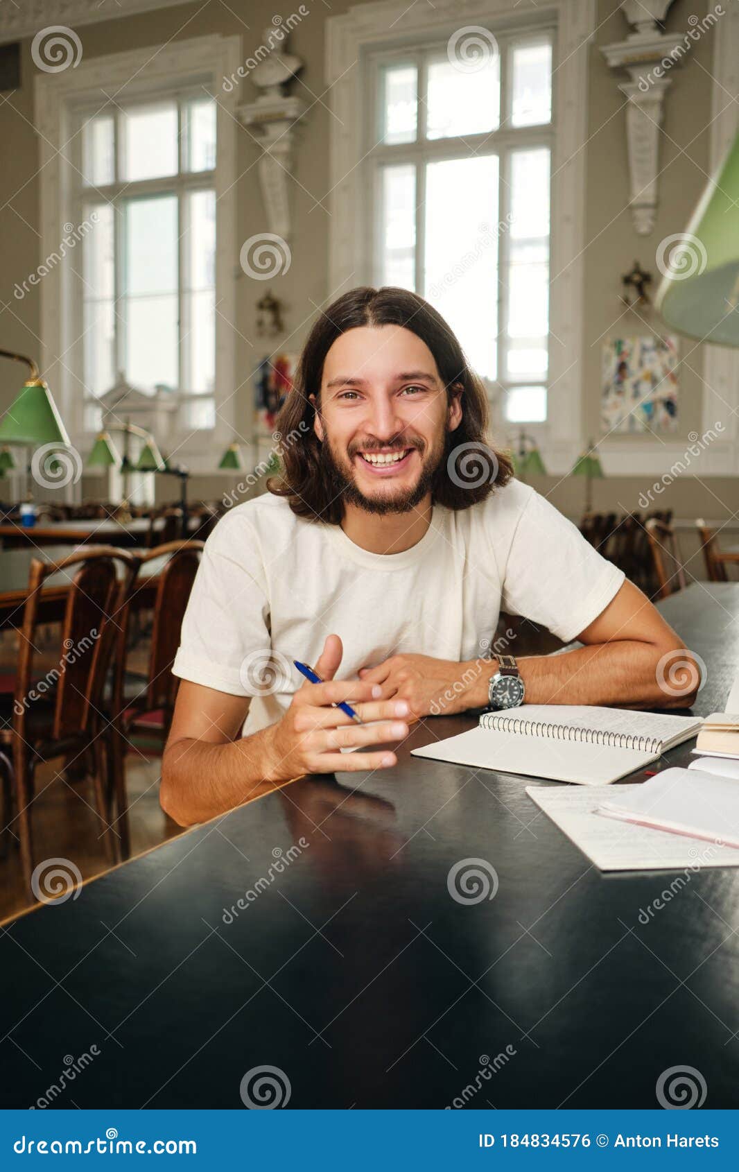 Young Attractive Smiling Male Student Joyfully Looking in Camera while ...