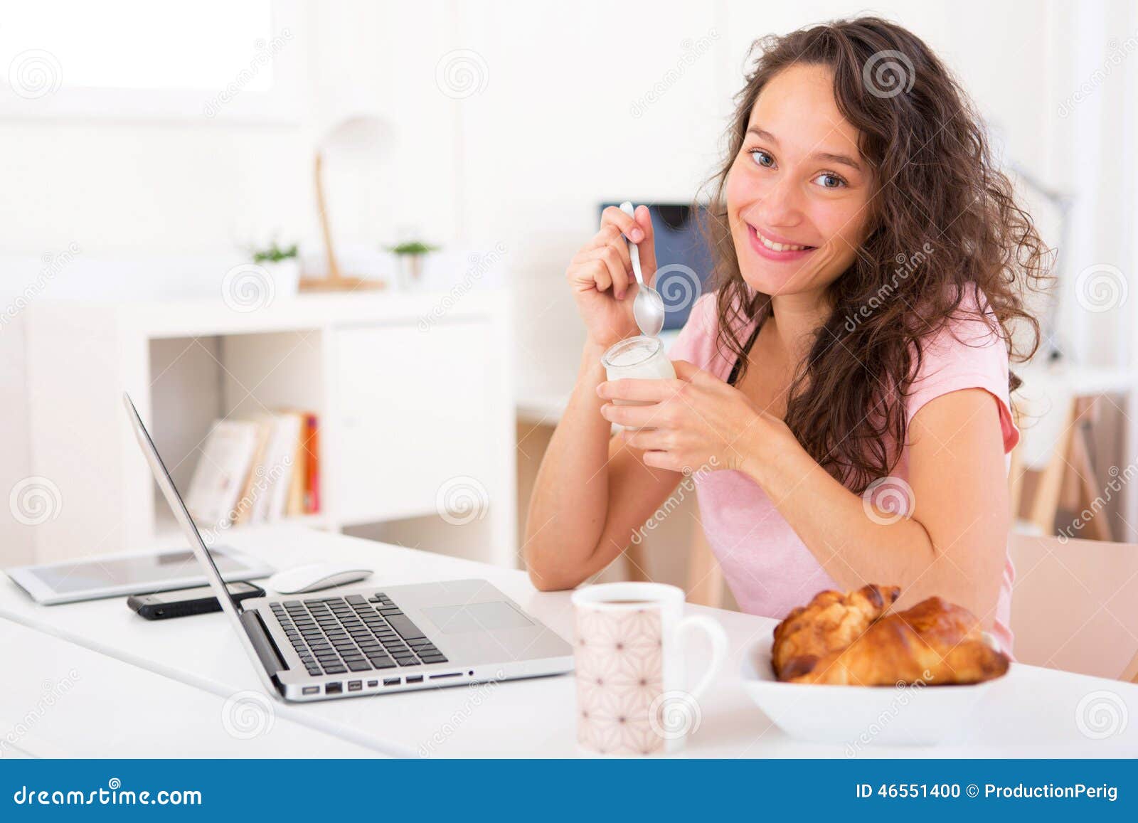 Young Attractive Student Taking Breakfast while Working Stock Photo ...