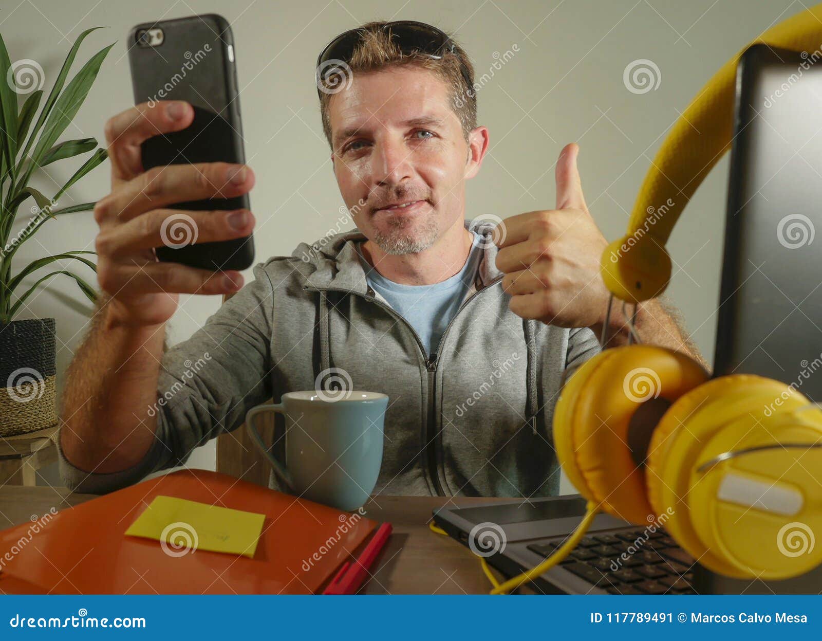 Young Attractive and Successful Self Employed Business Man Using Mobile ...