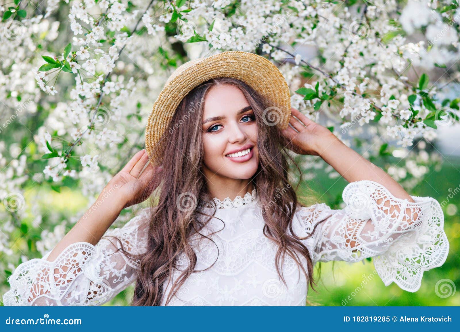 Young Attractive Woman With Curly Long Hair In Straw Hat Enjoying